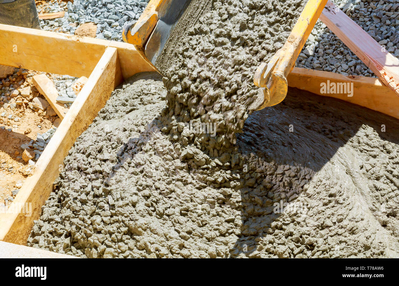 Building new concrete pavement for paving walkway to residential street ...