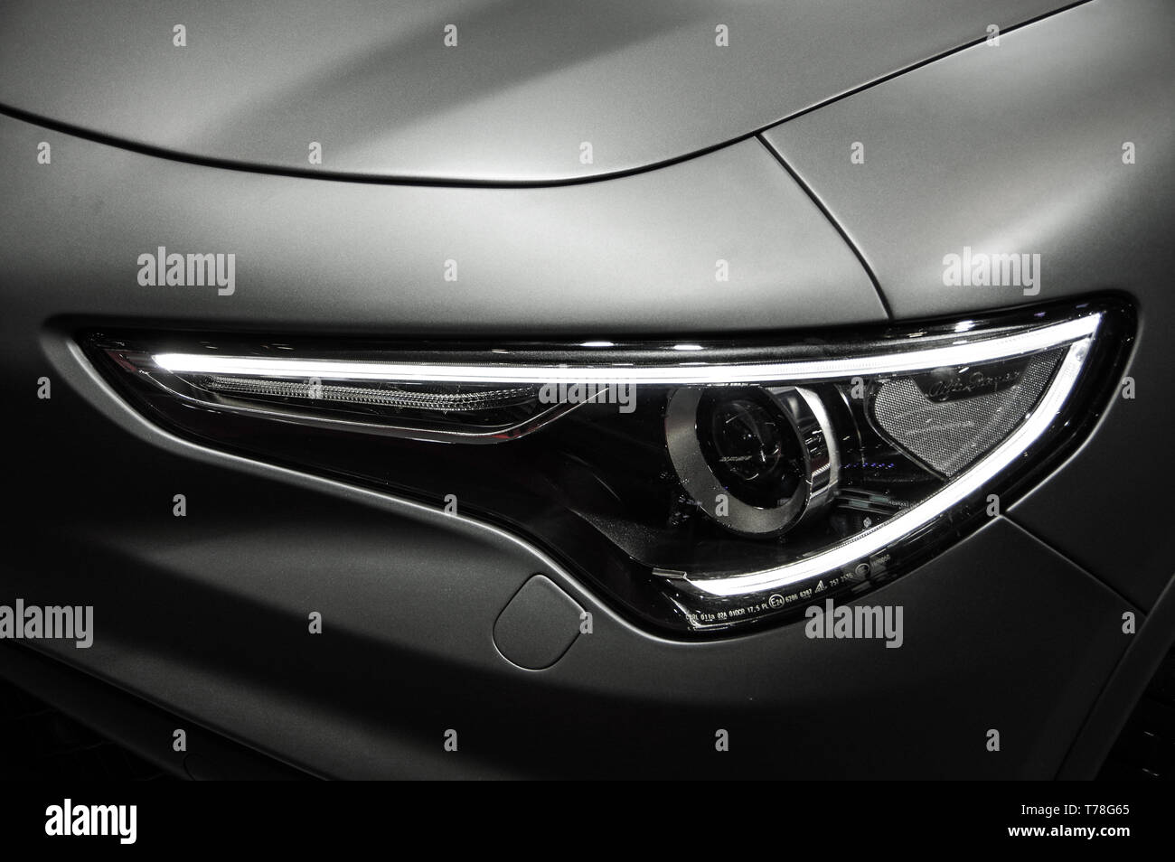 Modern grey car headlight details Stock Photo - Alamy