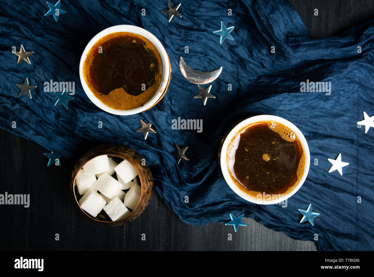 Turkish coffee and sugar cubes in copper cups top view Stock Photo - Alamy