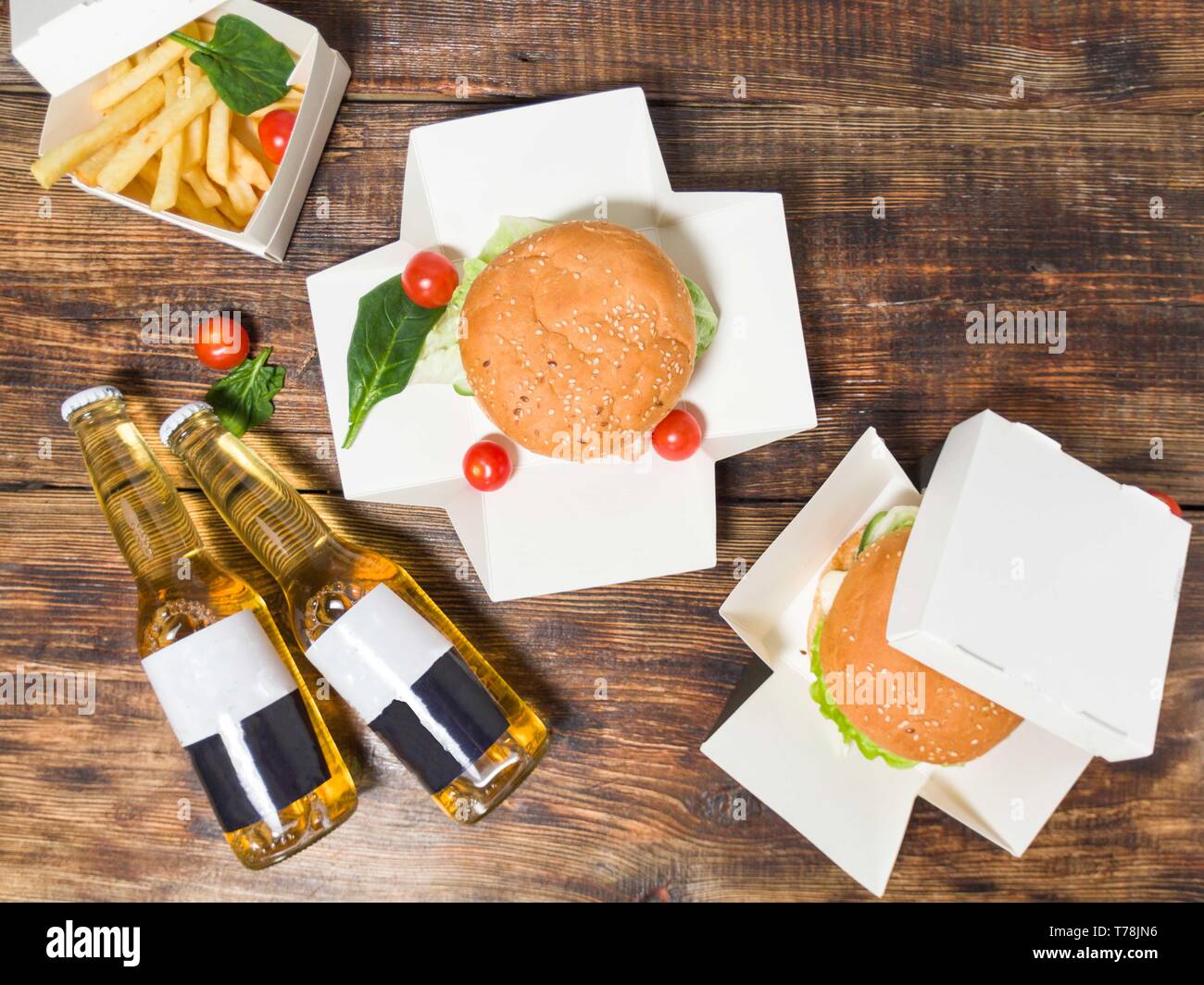 Food for two. Snack for two. Burgers and beer. Top view on burgers ...