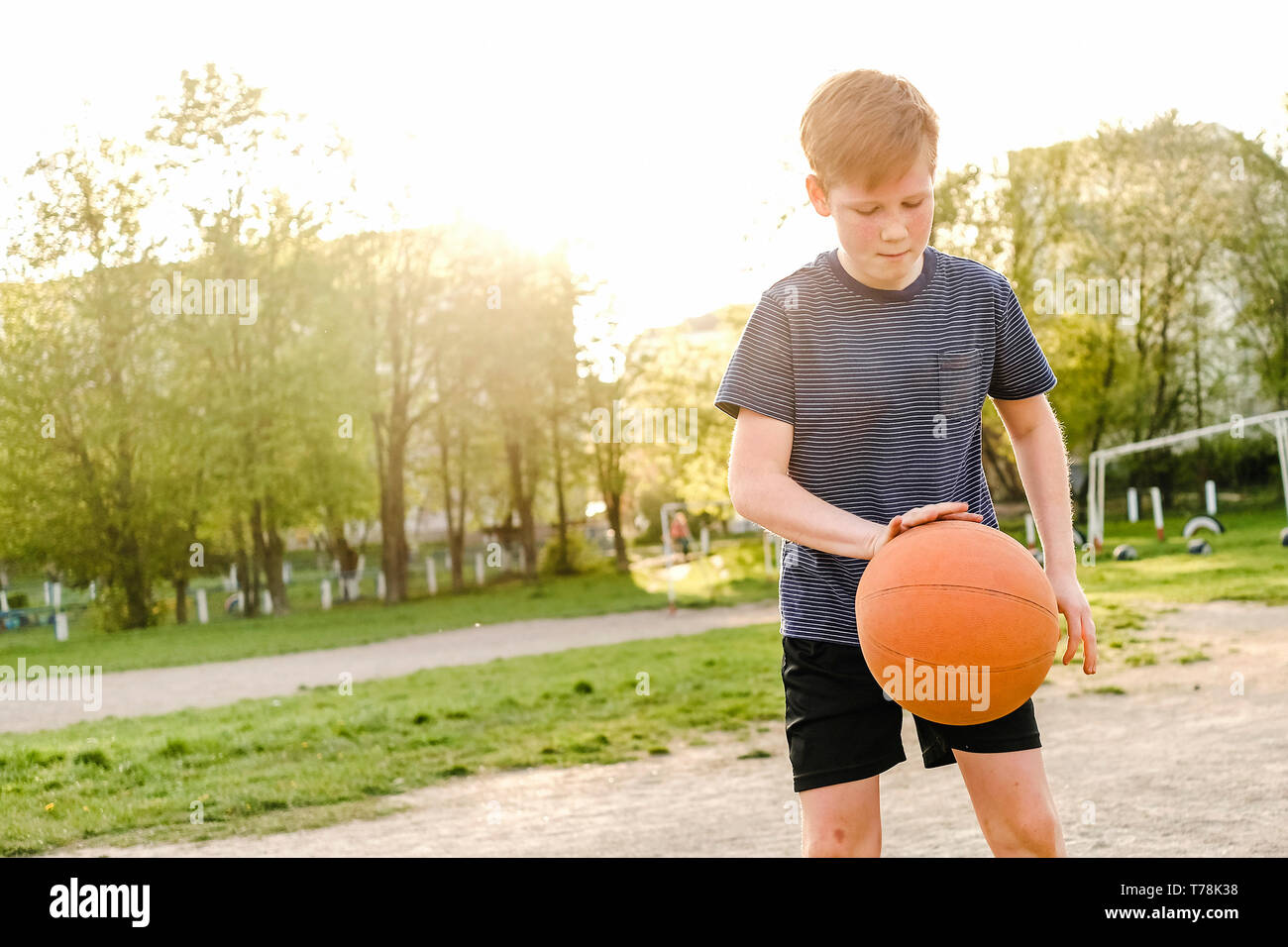 Child bouncing ball hi-res stock photography and images - Alamy