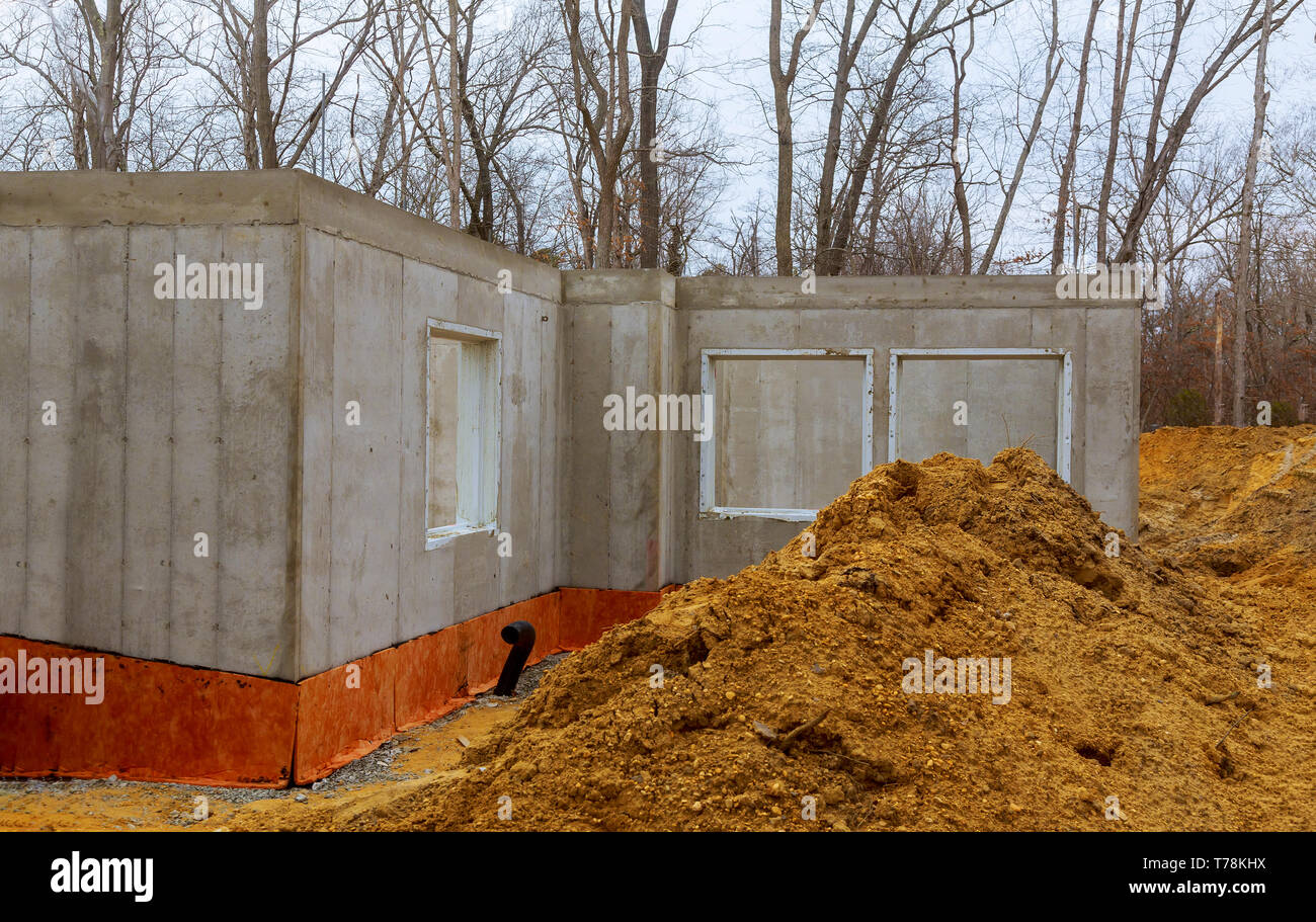 The construction site of a new home poured foundation of concrete ...