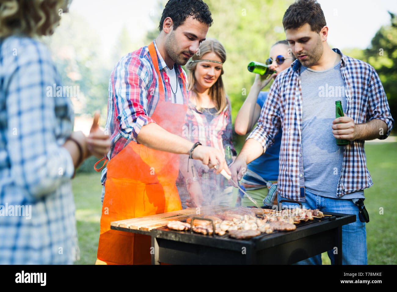 Young and happy people in nature having fun Stock Photo - Alamy