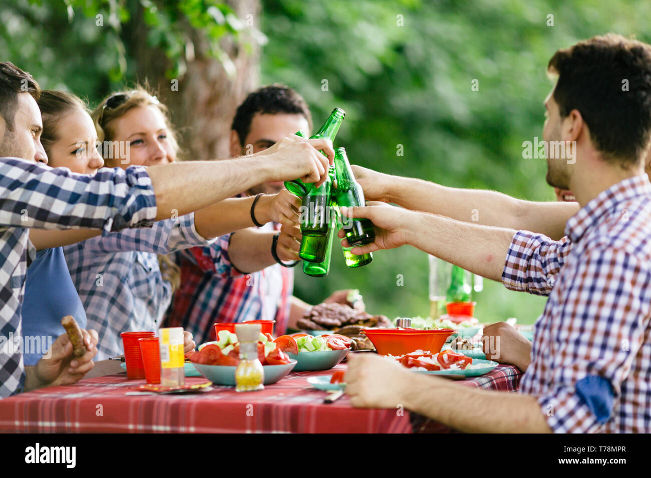 Young people in nature having fun and smiling Stock Photo - Alamy