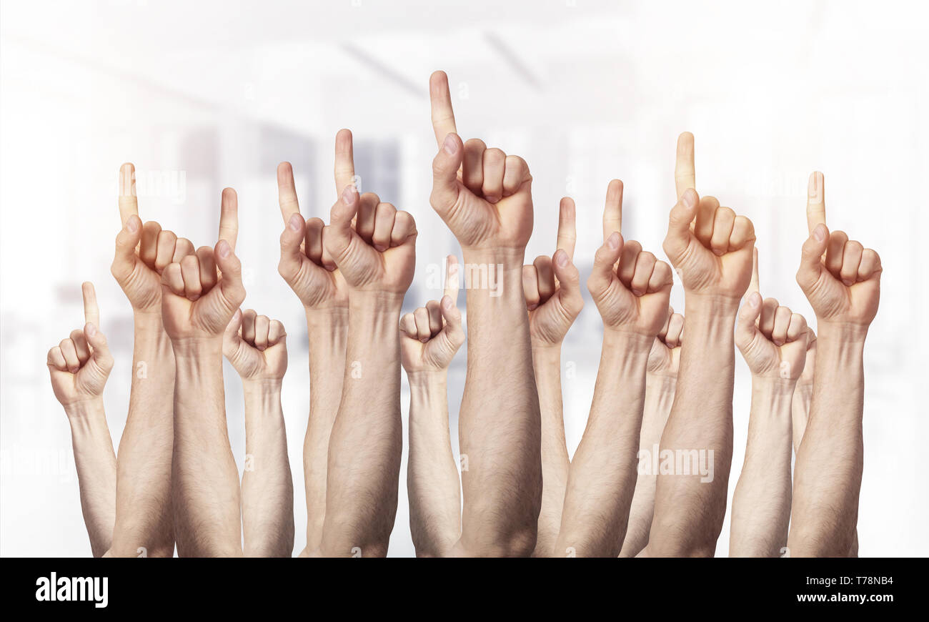 Row of man hands showing finger pointing gesture Stock Photo - Alamy