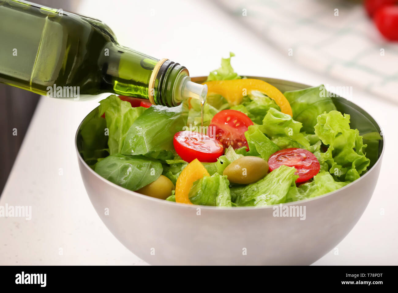 Adding salad dressing hi-res stock photography and images - Alamy