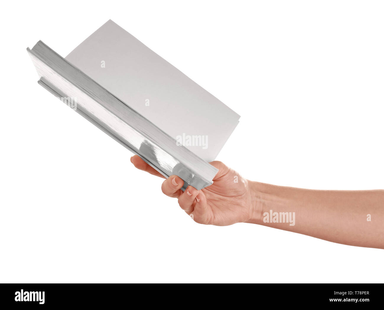 Female hand holding book on white background Stock Photo - Alamy