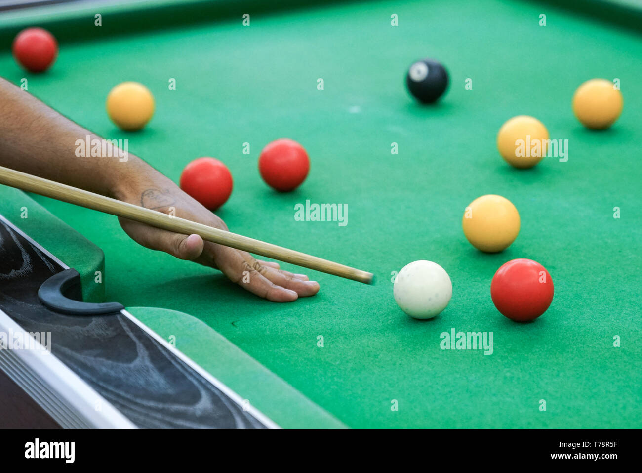 Playing pool balls on green table close up Stock Photo - Alamy