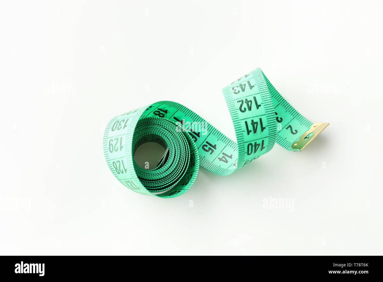 Measuring tape on white background Stock Photo - Alamy