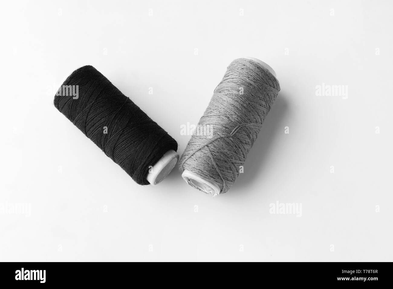Color threads on white background Stock Photo - Alamy