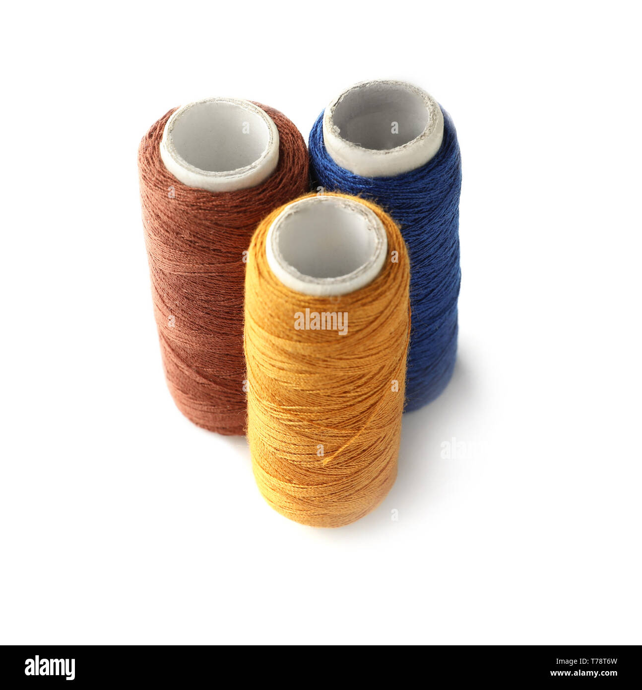 Color threads on white background Stock Photo - Alamy