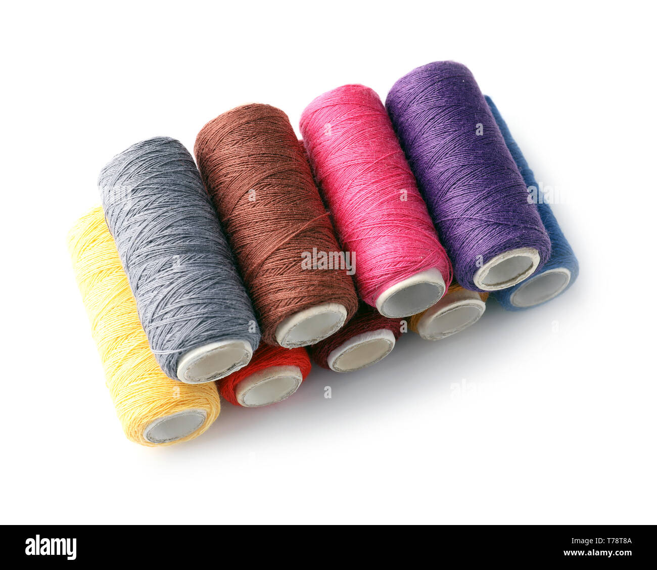 Color threads on white background Stock Photo - Alamy