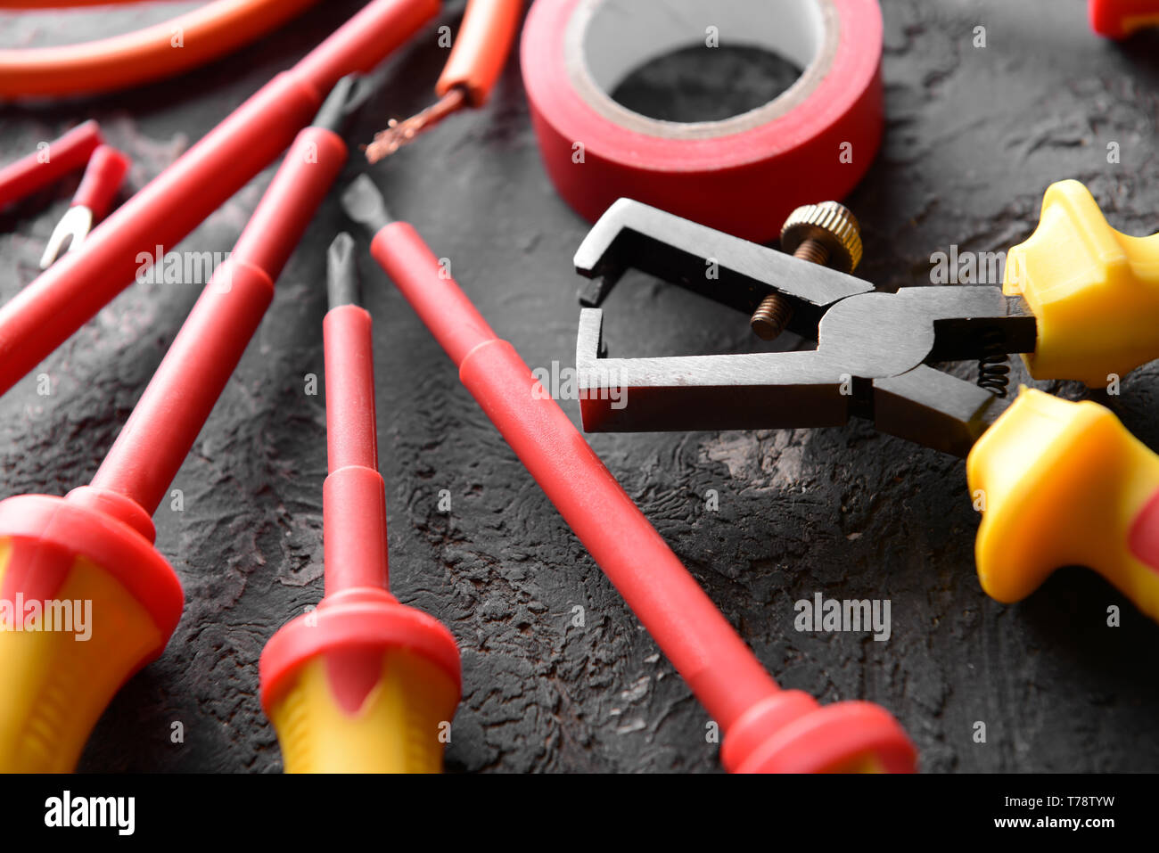 Different electrician's supplies on grey background, closeup Stock ...