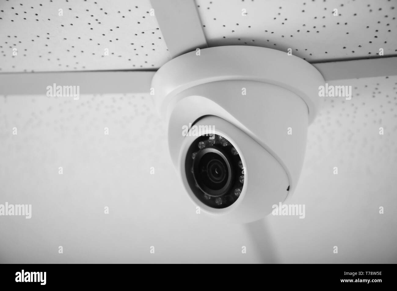 Modern CCTV security camera installed indoors Stock Photo - Alamy