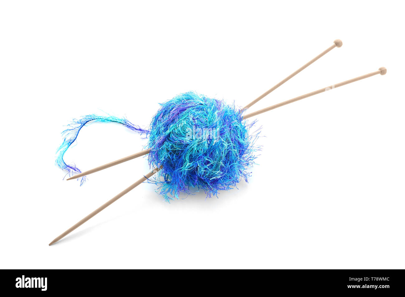 Ball of thread with knitting needles on white background Stock Photo ...