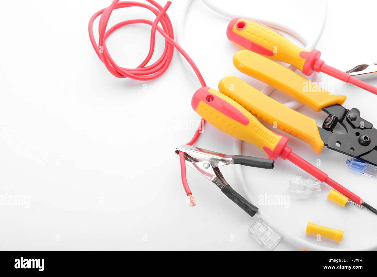 Electrician's supplies on white background Stock Photo - Alamy