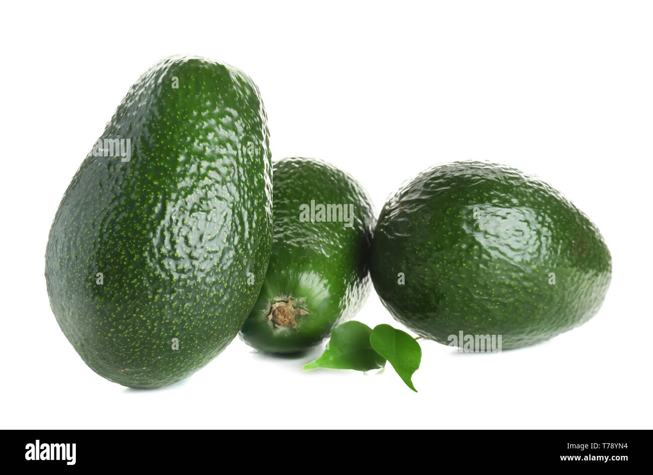 Ripe avocados on white background Stock Photo - Alamy