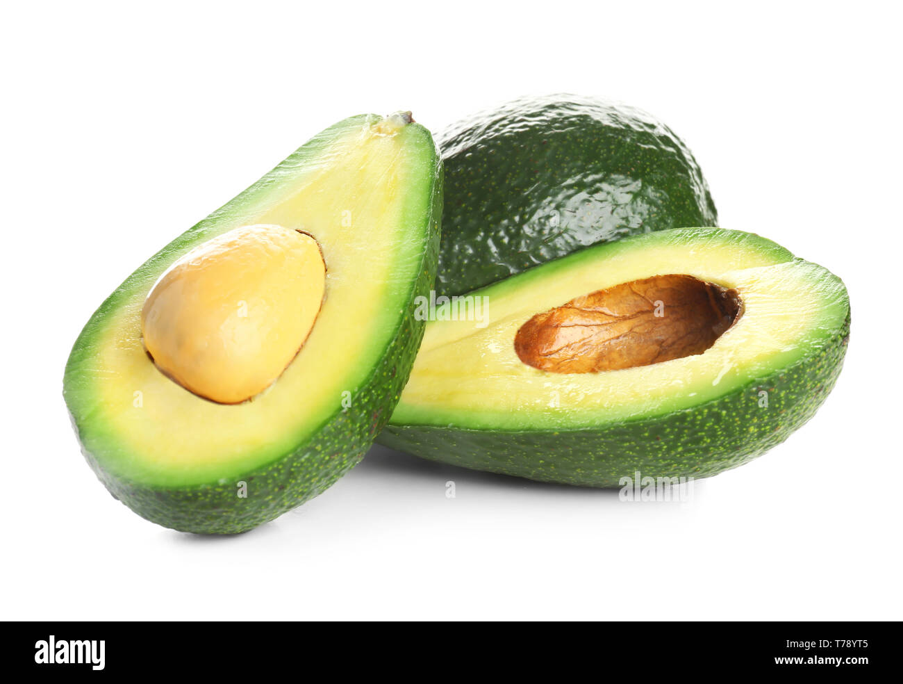 Ripe avocados on white background Stock Photo - Alamy