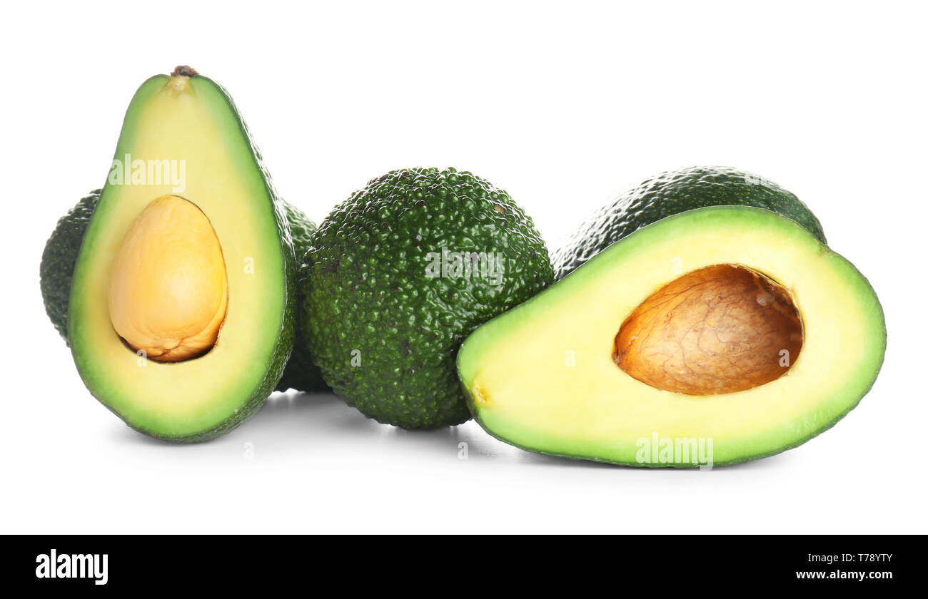 Ripe avocados on white background Stock Photo - Alamy