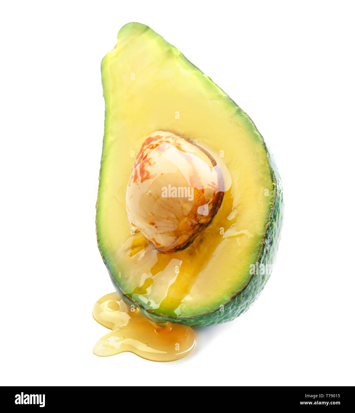 Half of ripe avocado on white background Stock Photo - Alamy
