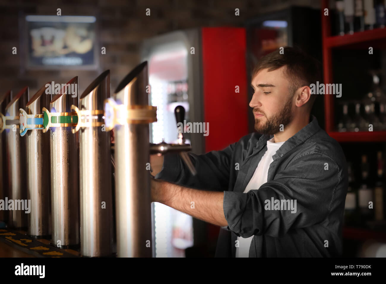 Man pouring beer in hop hi-res stock photography and images - Alamy