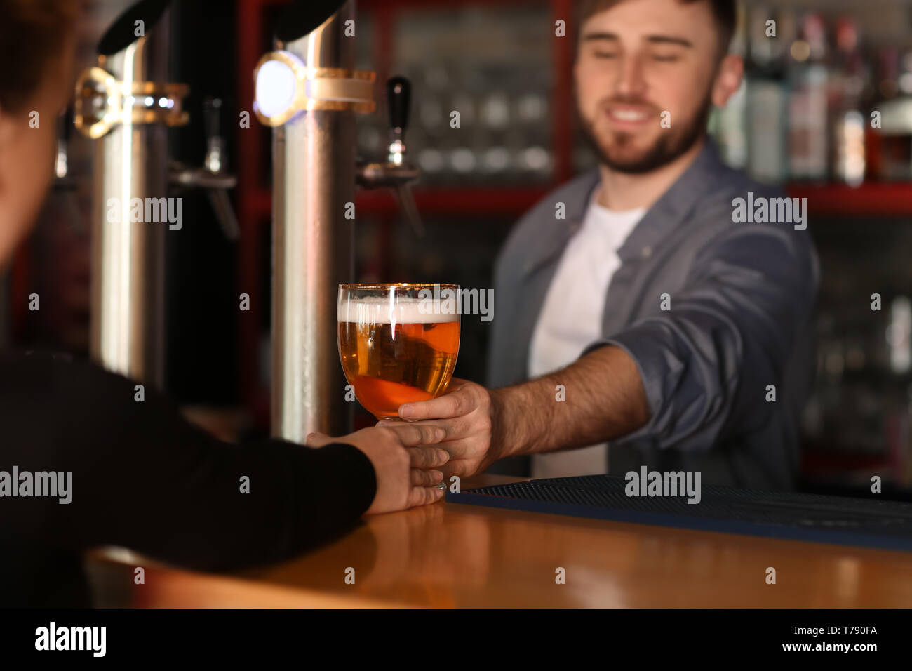 Barman waitress bar in restaurant hi-res stock photography and images ...