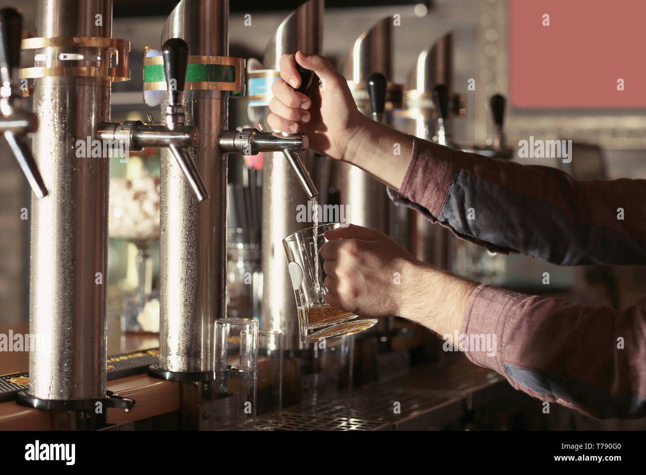 Man pouring beer in hop hi-res stock photography and images - Alamy