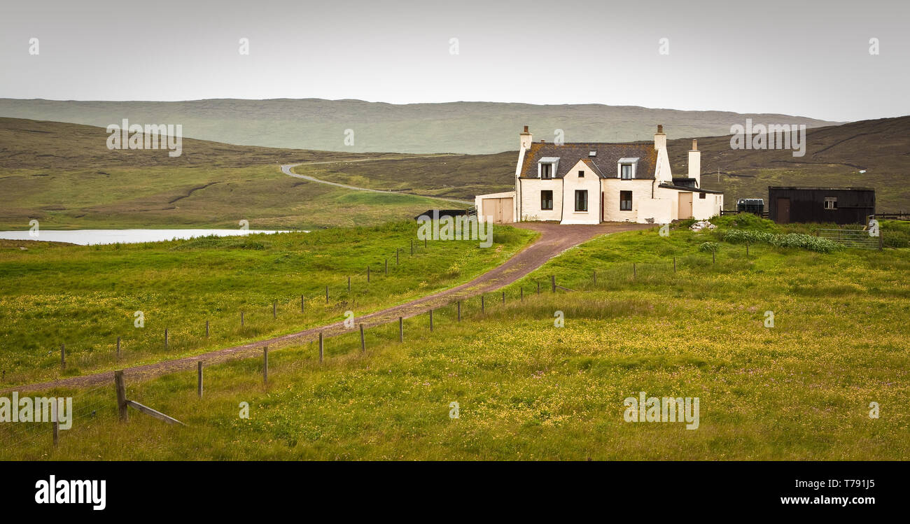 Remote home in the Shetland Isles, North of Scotland, UK Stock Photo ...