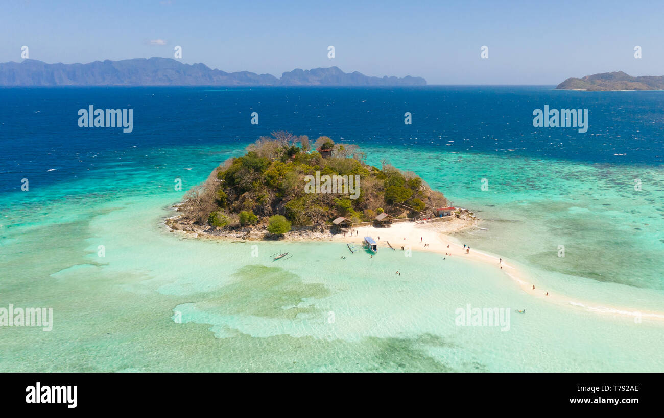 Small tropical island with white beach, top view.The island with white ...