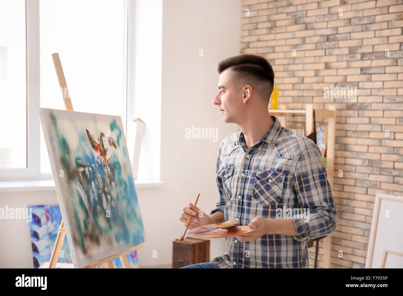 Young man paints abstract art hi-res stock photography and images - Alamy