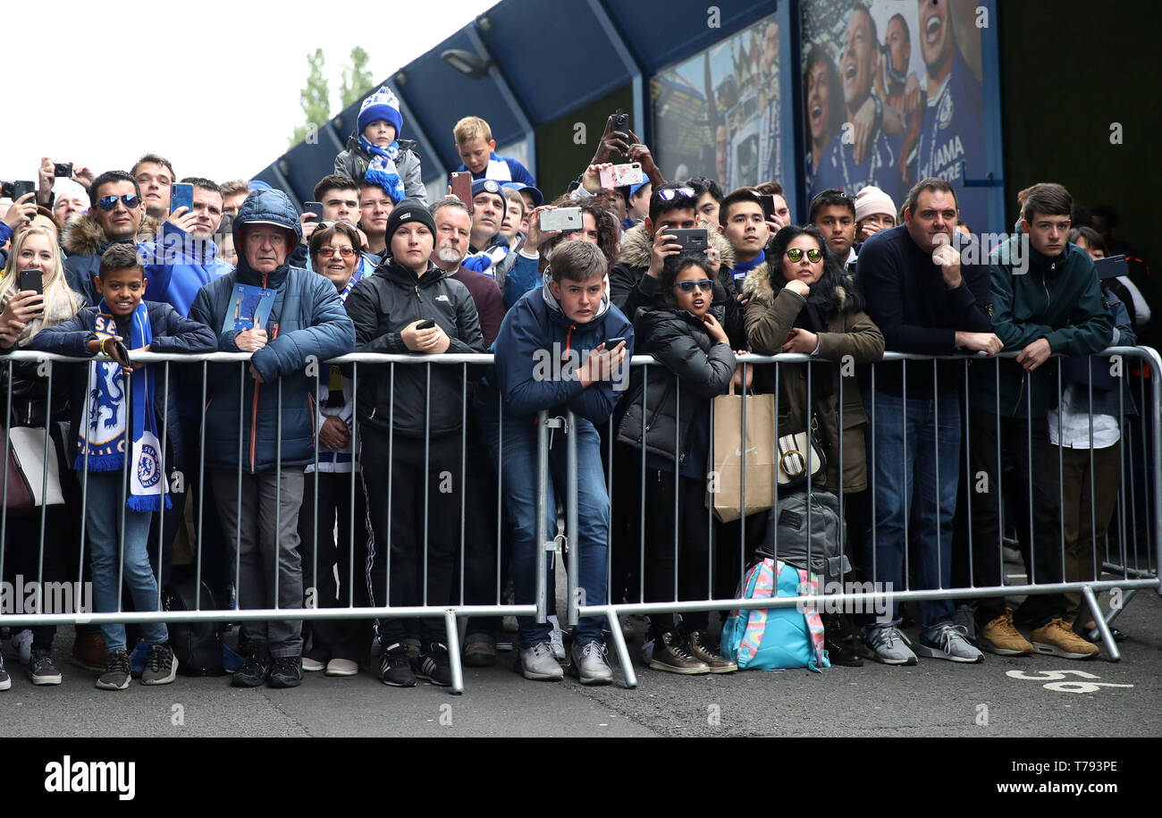 Chelsea fans await the arrival of the team during the Premier League ...