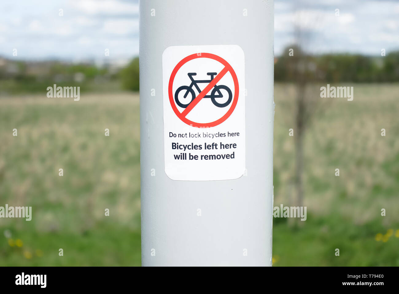 Bicycles left here will be removed sign warning for cyclists Stock ...