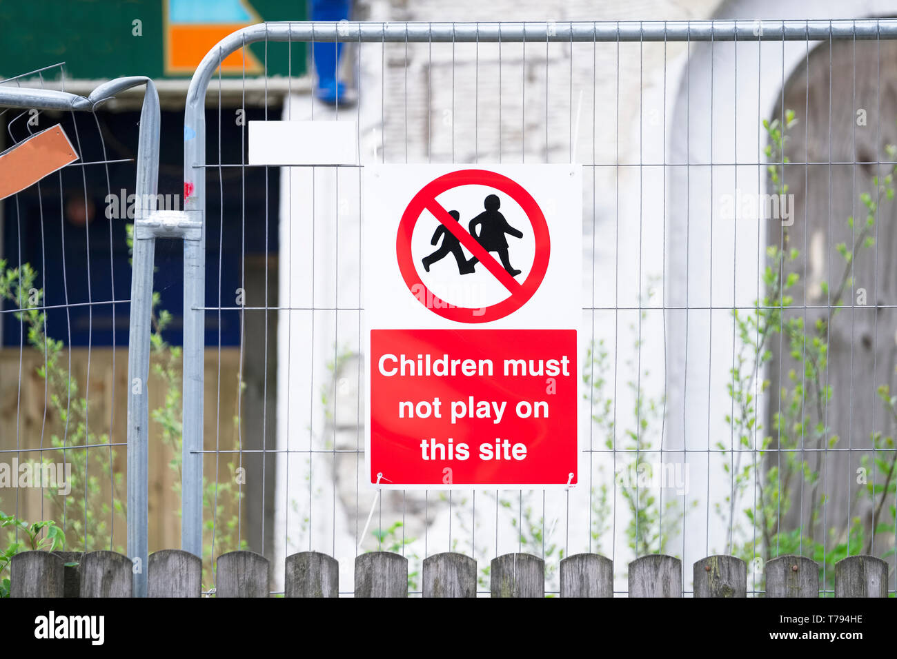 Children must not play on scaffolding at construction building site ...