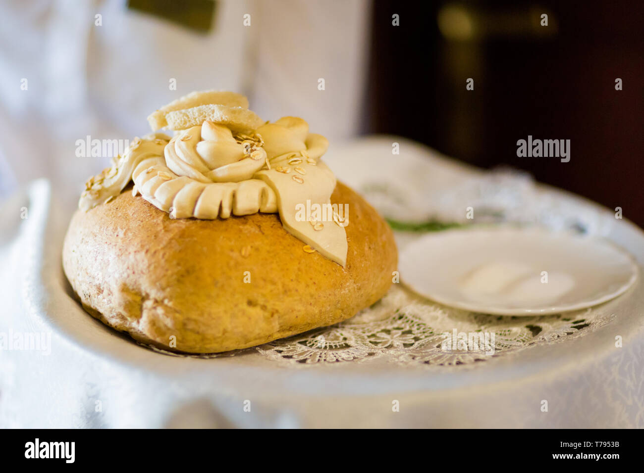 Wedding bread with salt detail on hands- traditional polish inviting to ...