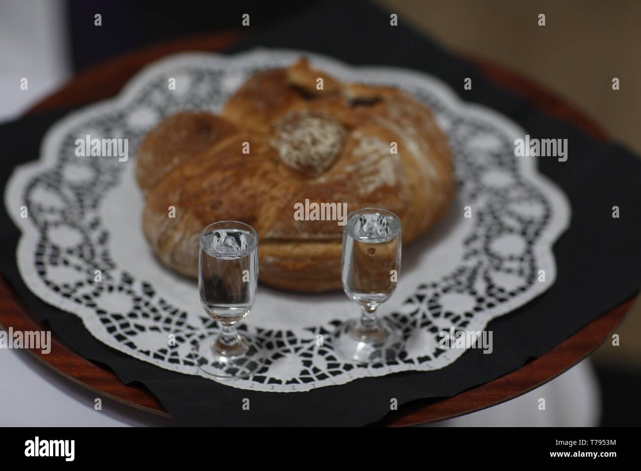 Wedding bread with salt detail on hands- traditional polish inviting to ...