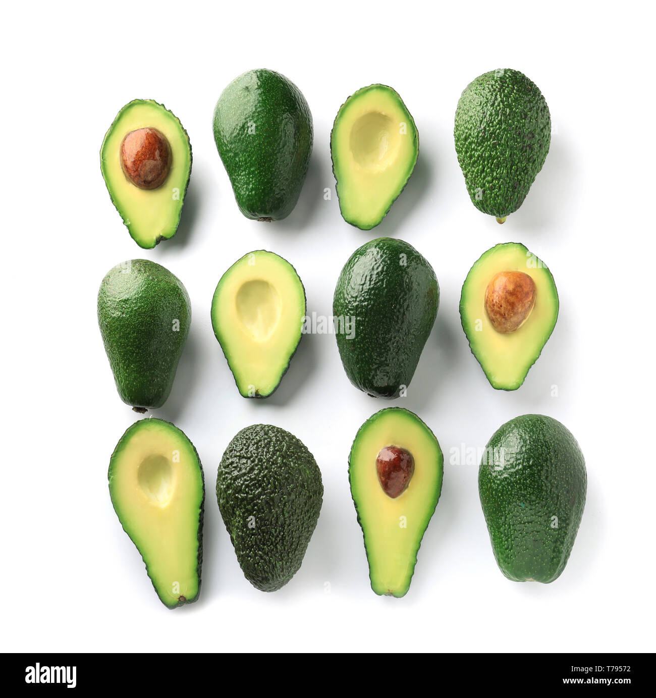 Fresh avocados on white background, flat lay Stock Photo - Alamy