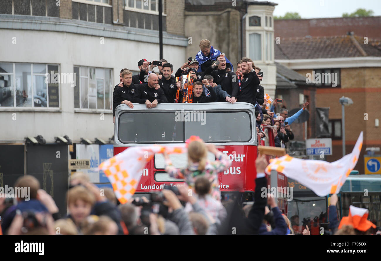 Luton Town players celebrate during the victory parade at St George's ...