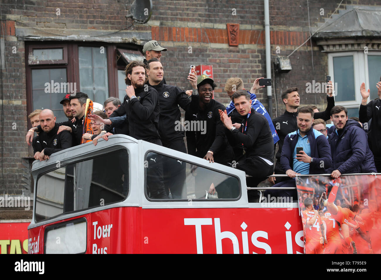 Luton Town players celebrate during the victory parade at St George's ...