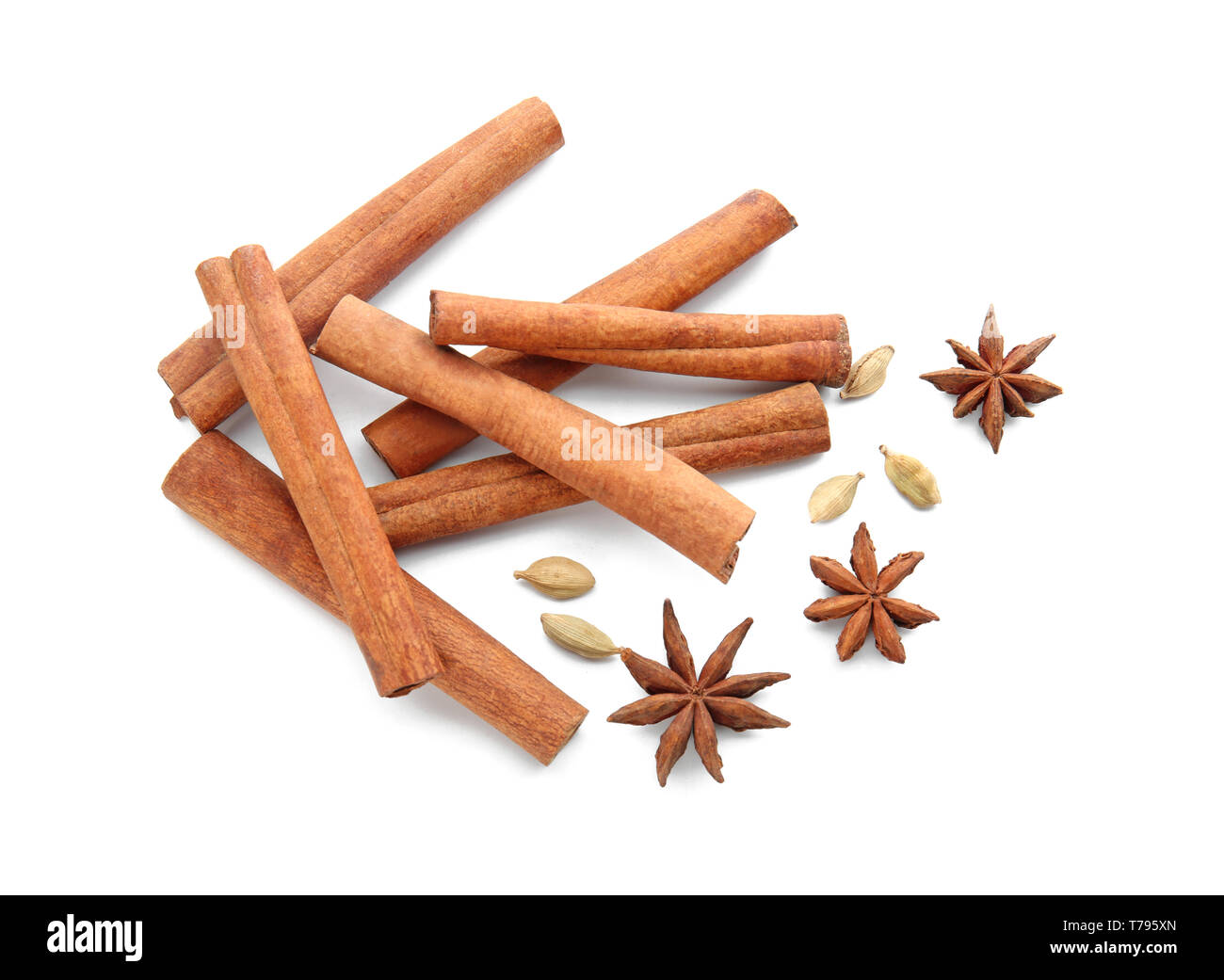 Cinnamon sticks, cardamom and anise stars on white background Stock ...