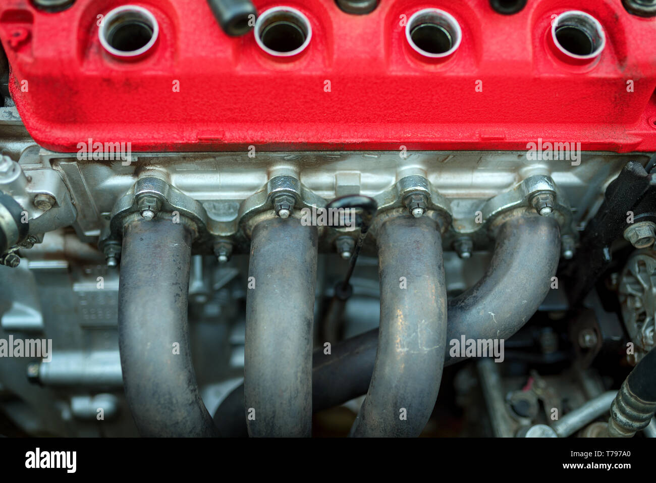Four-cylinder gasoline engine red color Stock Photo - Alamy