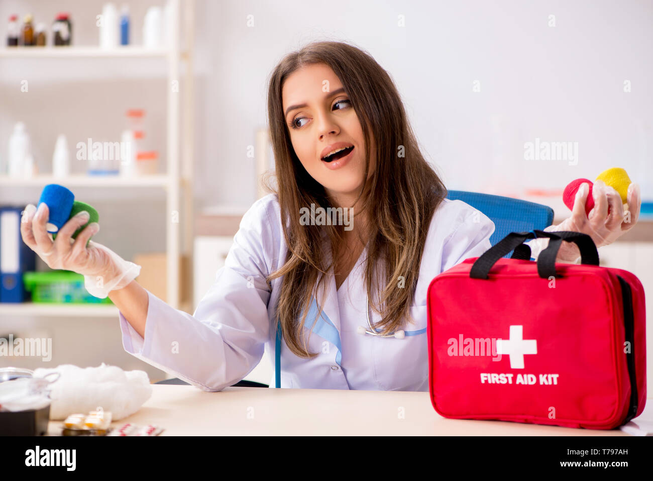 Female beautiful doctor with first aid bag Stock Photo - Alamy