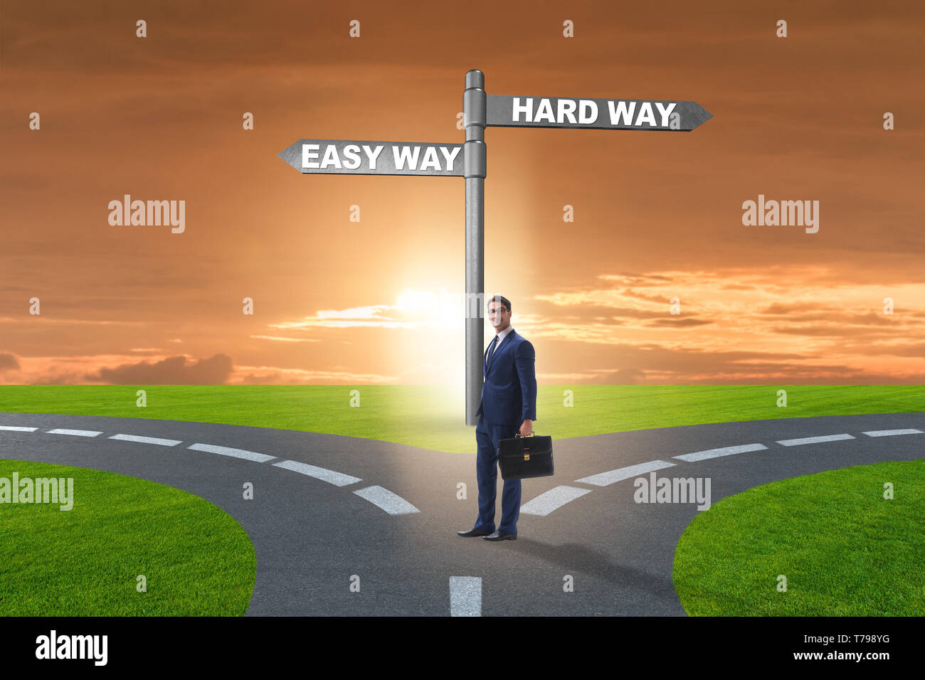 Businessman choosing between hard and easy way Stock Photo - Alamy