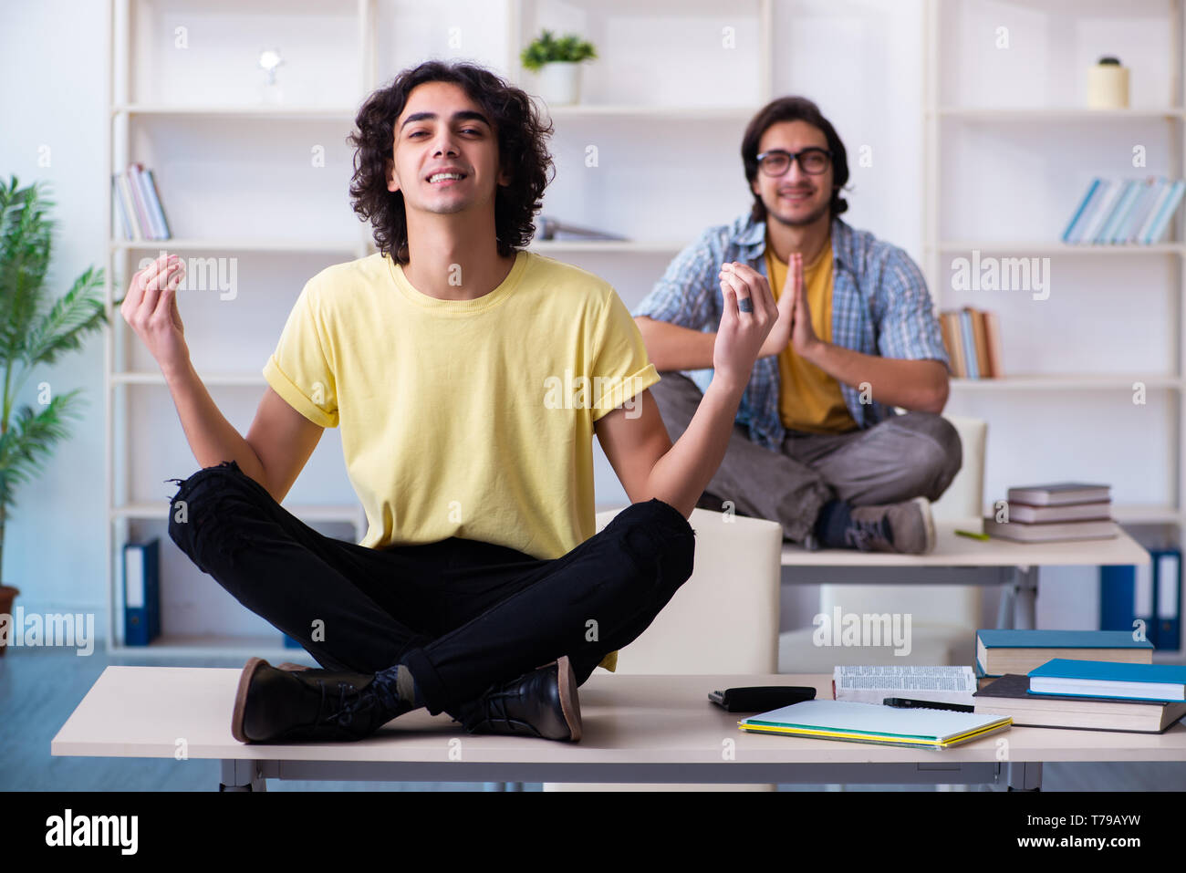 Two male students in the classroom Stock Photo - Alamy