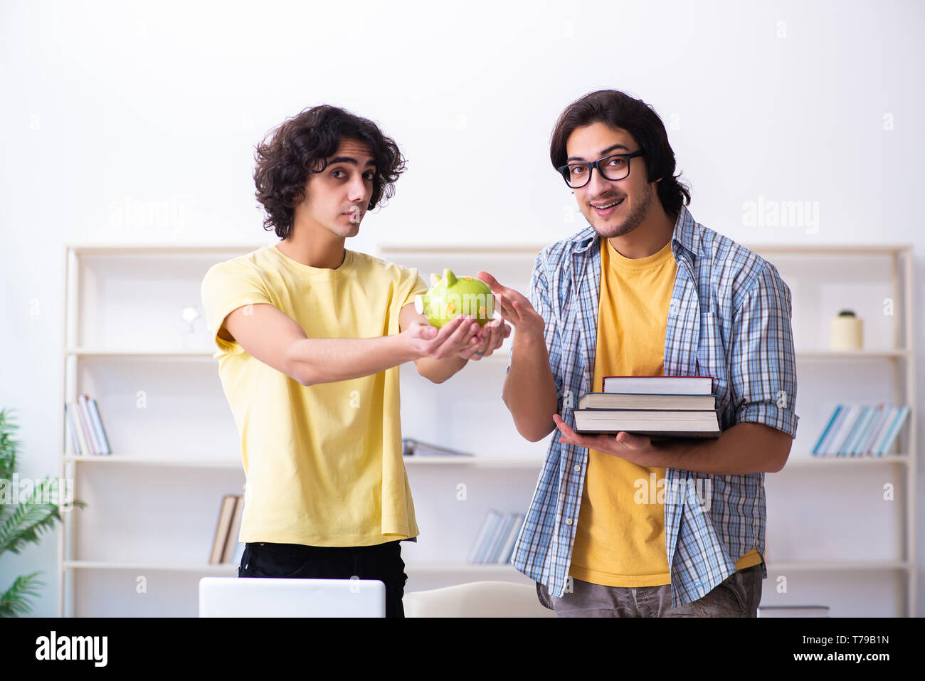Two male students in the classroom Stock Photo - Alamy