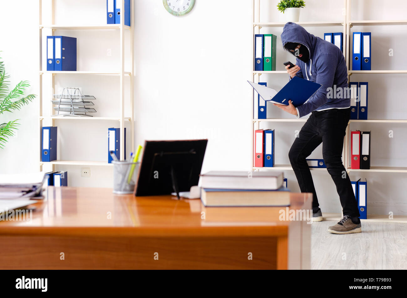 Spy taking photo secret documents hi-res stock photography and images ...