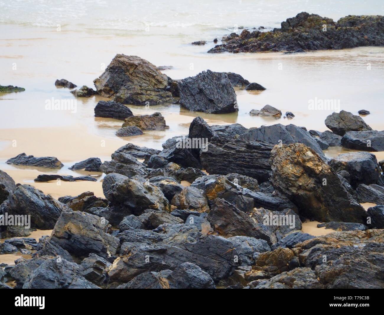 Rocks at the beach Stock Photo - Alamy