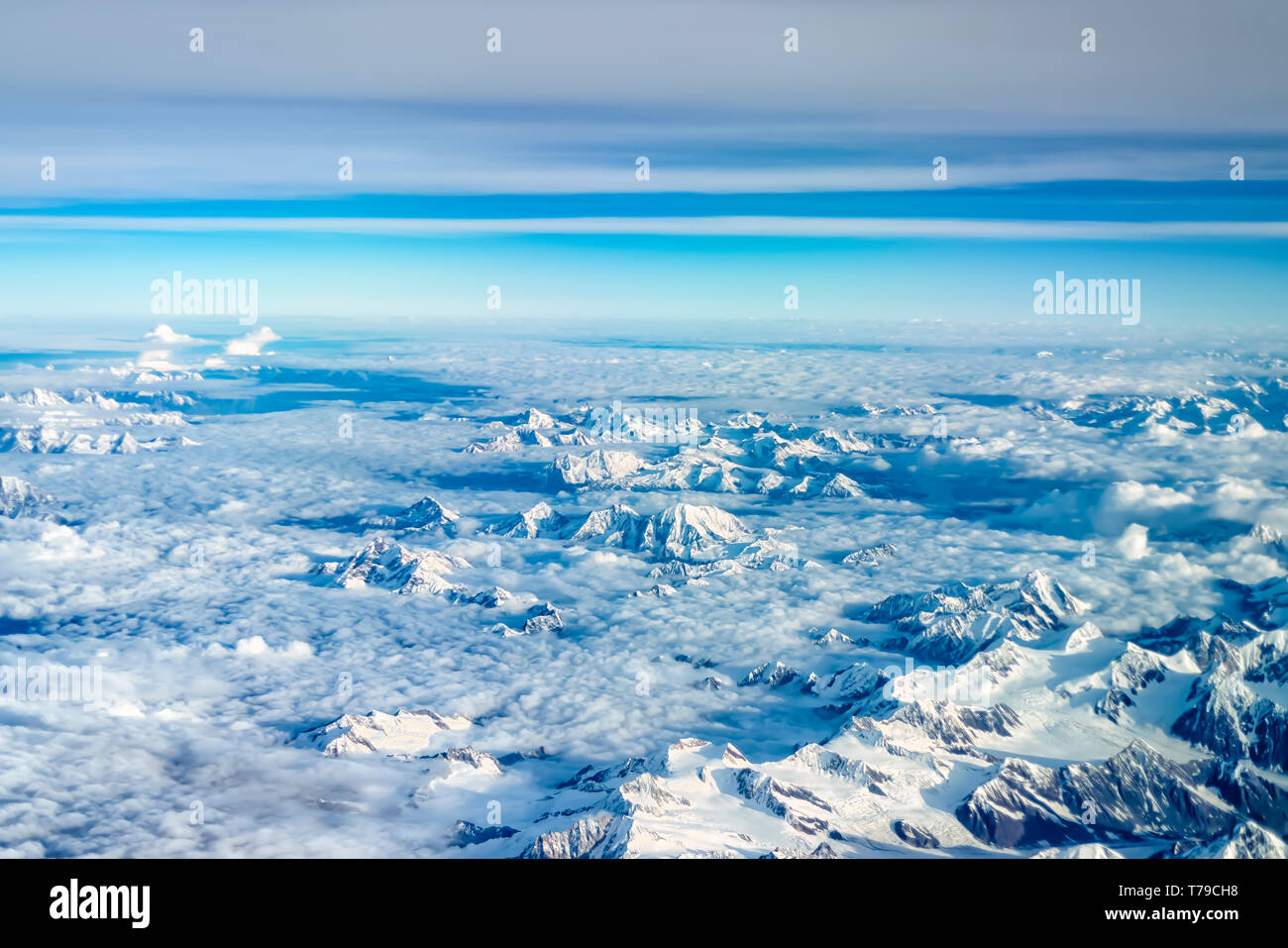 The snow covered peaks of the Dhauladhar/White range of the lesser ...