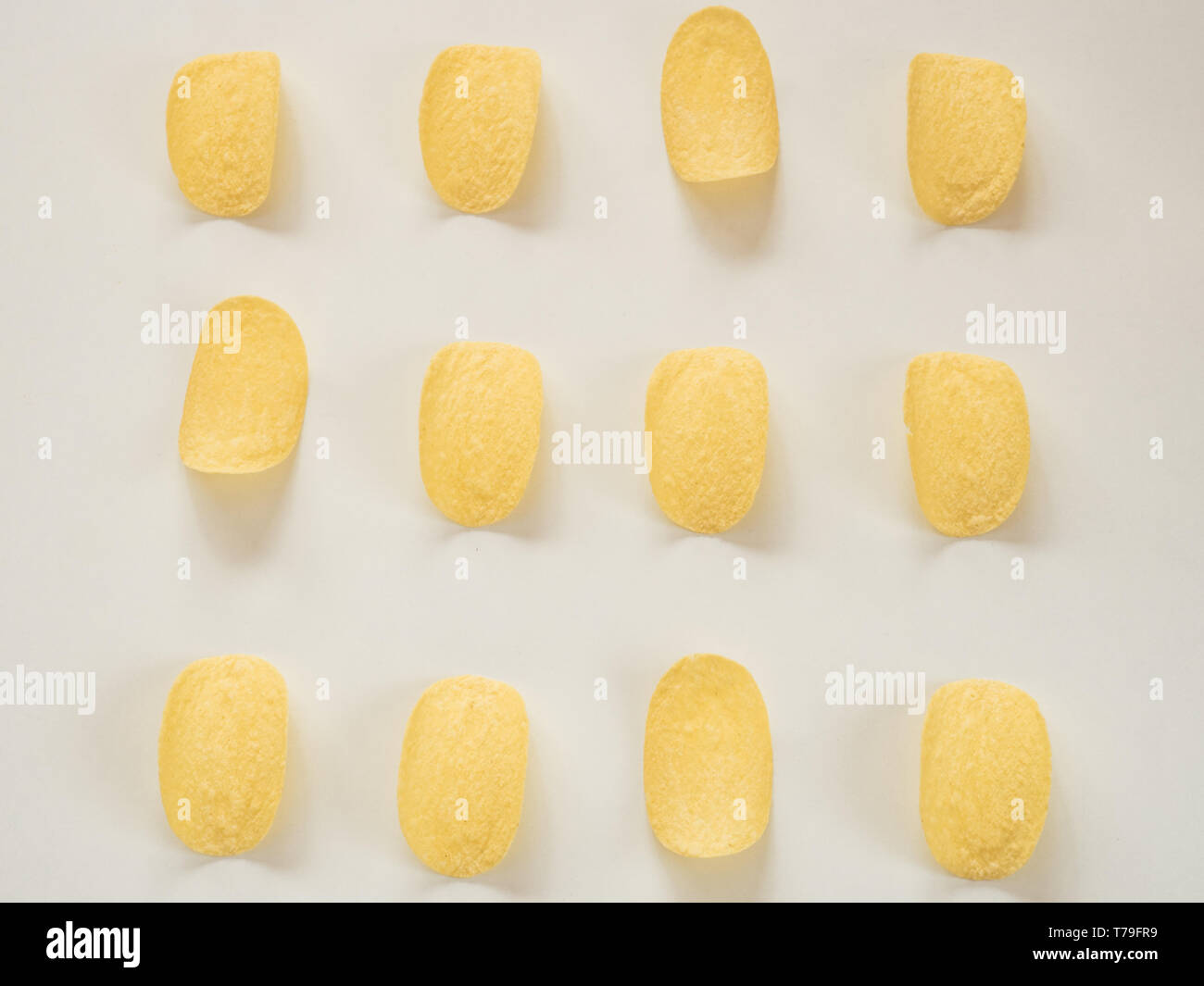 Potato chips pattern on white background Stock Photo - Alamy