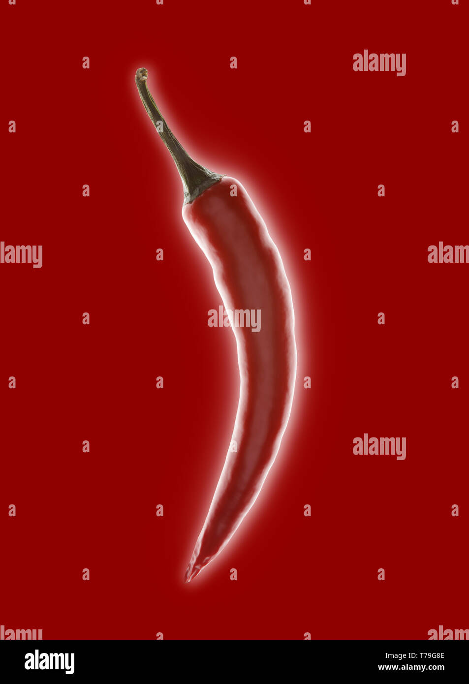 Single red chilli pepper with backlight glow on a red background Stock ...