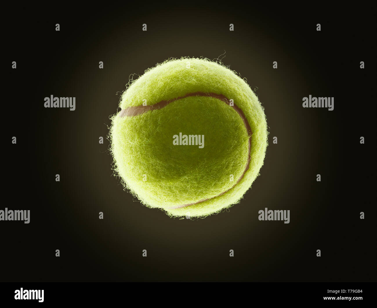 single tennis ball with eclipse like effect on a dark background Stock ...